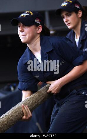 aircraft carrier, CVN 76, mooring lines, Sailors, U.S. Navy, USS Ronald ...