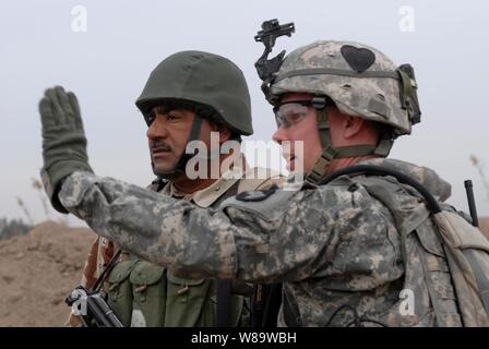 A team from 1st Battalion (Airborne), 501st Infantry Regiment snow ...