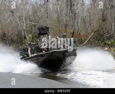 Special warfare combatant-craft crewmen (SWCC) transit the Salt River ...