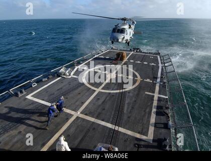 An SH-60B Seahawk helicopter assigned to the Naval Air Warfare Center ...