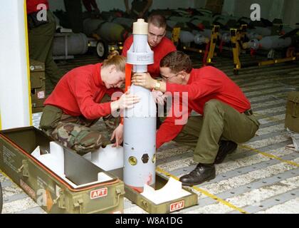(From left to right) Aviation Ordnanceman David Dorris, Joel Kopp ...