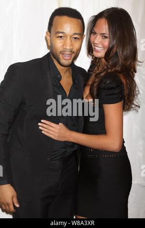 John Legend and Chrissy Teigen at the 2010 American Music Awards after ...