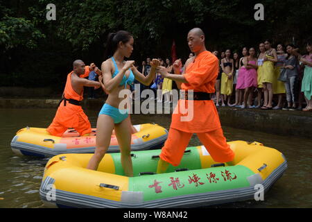 Chinese Shaolin monks instruct female rafting lifeguard candidates to ...