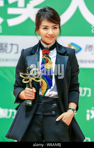 Chinese actress Liu Tao poses on the red carpet as she arrives for a ...