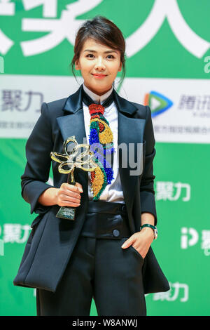Chinese actress Liu Tao poses on the red carpet as she arrives for a ...