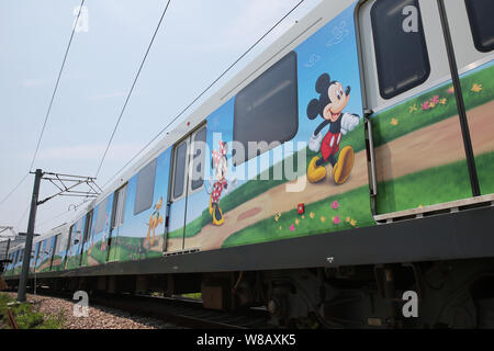 A Disney-themed subway train of the Shanghai Metro Line 11 linking the ...