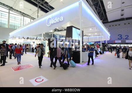 --FILE--People visit the stand of Midea during an exhibition in ...