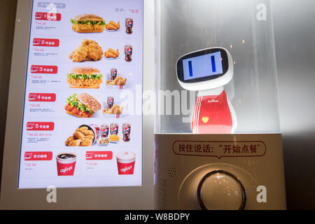The AI robot "Dumi" serves customers at the 'Original+' concept ...