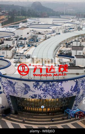 People visit the Wanda Mall at the Nanchang Wanda Cultural Tourism City ...