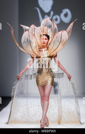 A model displays a new creation at the WOO show during the Shanghai ...