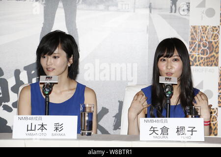 Yamamoto Sayaka, left, and Yagura Fuuko of Japanese girl group NMB48 pose at a promotional event ...