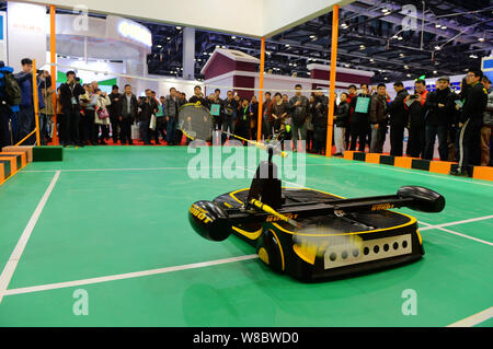 --FILE--The badminton robot Robomintoner plays badminton against a ...