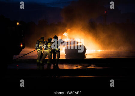 Marines use water to extinguish a fuel fire at Marine Corps Air Station ...