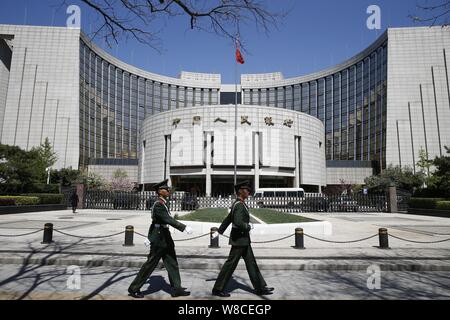 --FILE--Chinese paramilitary policemen patrol the Tian'anmen Square in ...