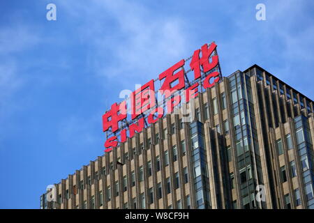 --FILE--The logo of Sinopec is on display on the rooftop of the ...