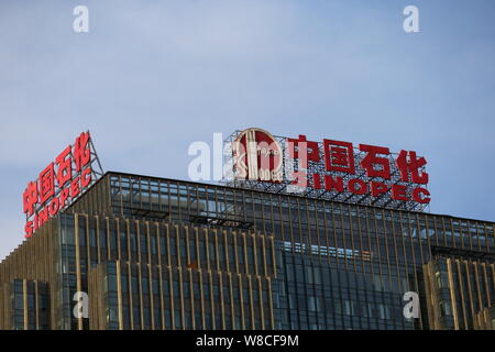 --FILE--The logo of Sinopec is on display on the rooftop of the ...