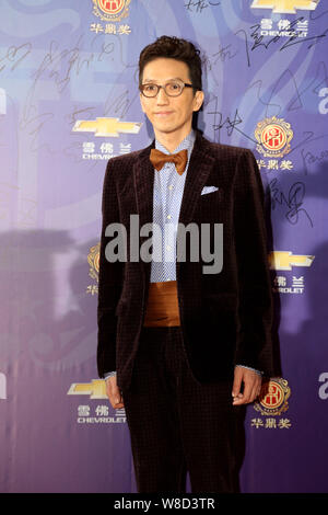Taiwanese singer Terry Lin poses on the red carpet as he arrives for ...