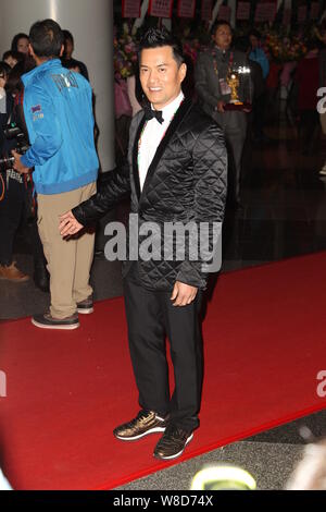 Hong Kong actor Ray Lui Leung-wai, right, poses with his wife on the ...