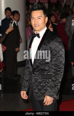 Hong Kong actor Ray Lui, right, poses with his wife Yang Xiaojuan ...