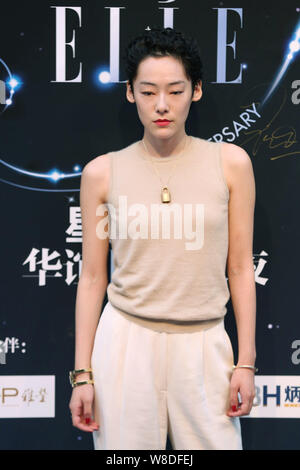 Japanese model Sayo Akasaka poses at a fashion event held by Huayi ...