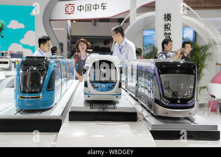 --FILE--Model trains are on display at the stand of CRRC (China Railway ...