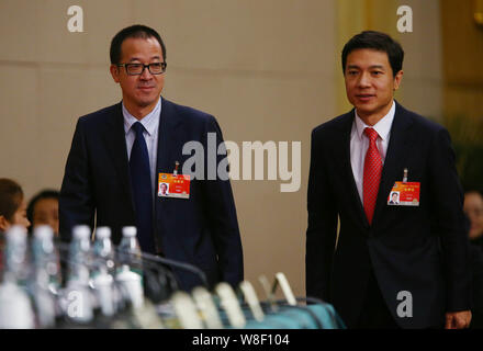 Michael Yu Minhong, right, founder and CEO of New Oriental Education ...
