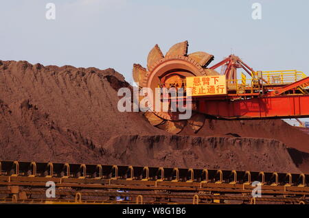 Cantilever bucket-wheel stacker reclaimer for handling of coal and ore ...