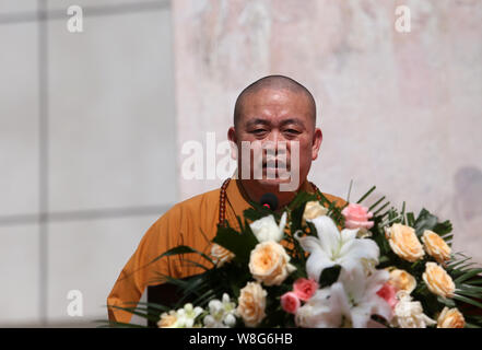 --FILE--Chinese abbot Shi Yongxin of the Shaolin Temple attends a forum ...