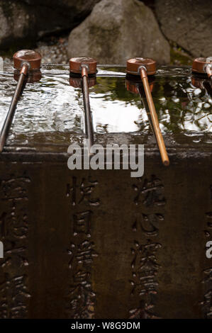 A Chozu-ya or Temizu-ya, a water purification fountain found in many ...