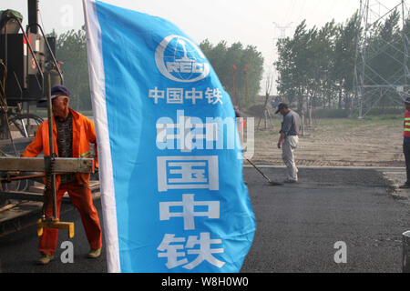 --FILE--Chinese workers of CREC (China Railway Engineering Corporation ...