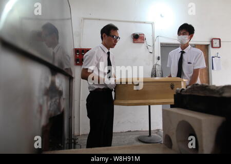 Luxury wooden coffin Stock Photo - Alamy