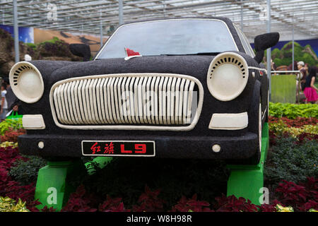 A full scale model of Chinese automaker FAW's Hongqi (Red Flag) L9 ...