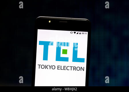 In this photo illustration a Tokyo Electron logo seen displayed on a ...