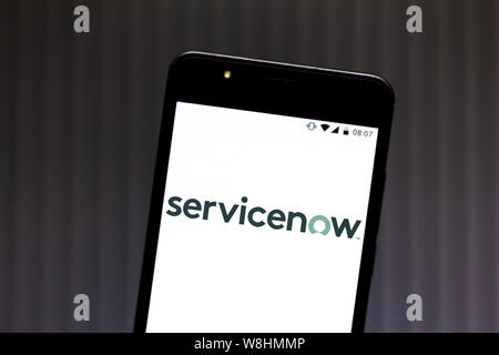 In this photo illustration, the ServiceNow logo is displayed on a ...