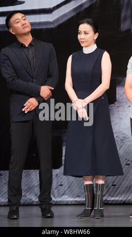 Chinese actor Hu Jun, right, and actress Su Yan arrives at the 25th ...