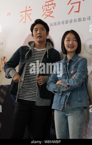 Chinese actress Zhou Dongyu, right, speaks as South Korean actor Lee ...