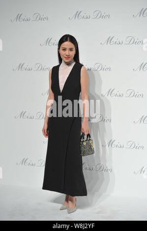 Chinese actress Michelle Ye Xuan poses as she arrives on the red carpet ...