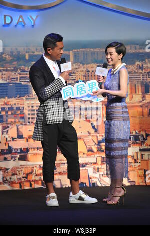 Taiwanese actress Amber Kuo, right, and Hong Kong actor Louis Koo ...