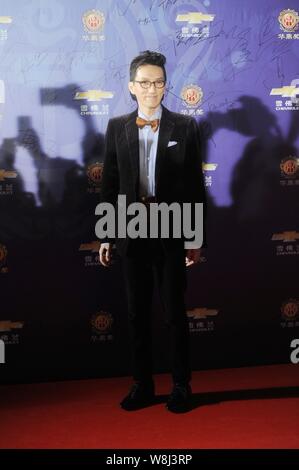 Taiwanese singer Terry Lin poses on the red carpet as he arrives for ...