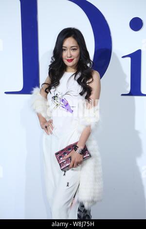 Taiwanese model, actress and TV presenter Jessey Meng poses as she ...