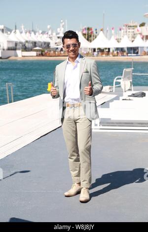 Chinese actor Xia Yu poses at a photocall for his movie "The Ghouls ...