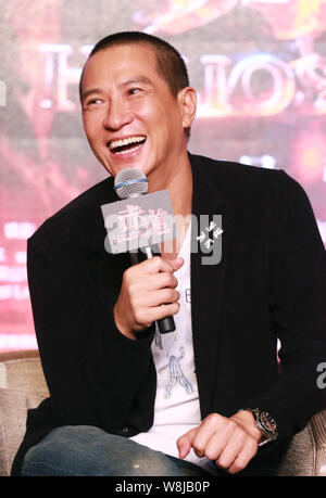 Hong Kong singer and actor Nick Cheung reacts during a press conference ...