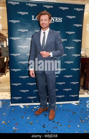 Australian actor Simon Baker-Denny poses at the opening ceremony of ...