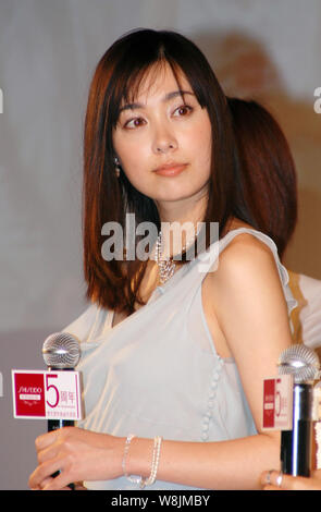 --FILE--Japanese actress Kazue Fukiishi reacts at a press conference ...