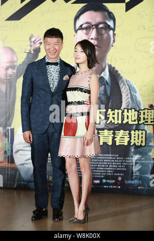 Chinese actor Sun Honglei, left, and actress Chen Hong pose at the red ...