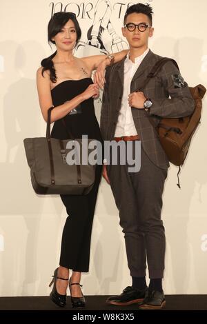 Taiwanese model Candy Wang, left, and actor Kai Ko pose during a press ...