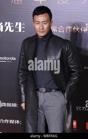 Chinese actor Hu Jun arrives on the red carpet for the Esquire Man at ...