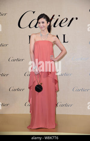 Taiwanese actress Charlie Yeung poses for photographers during a ...