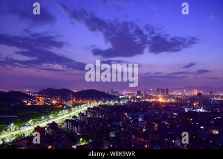 Night view of Qianjiang New Town with reflection, Hangzhou, Zhejiang ...