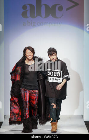 Hong Kong singers Ekin Cheng, right, and Joey Yung pose in Hong Kong ...